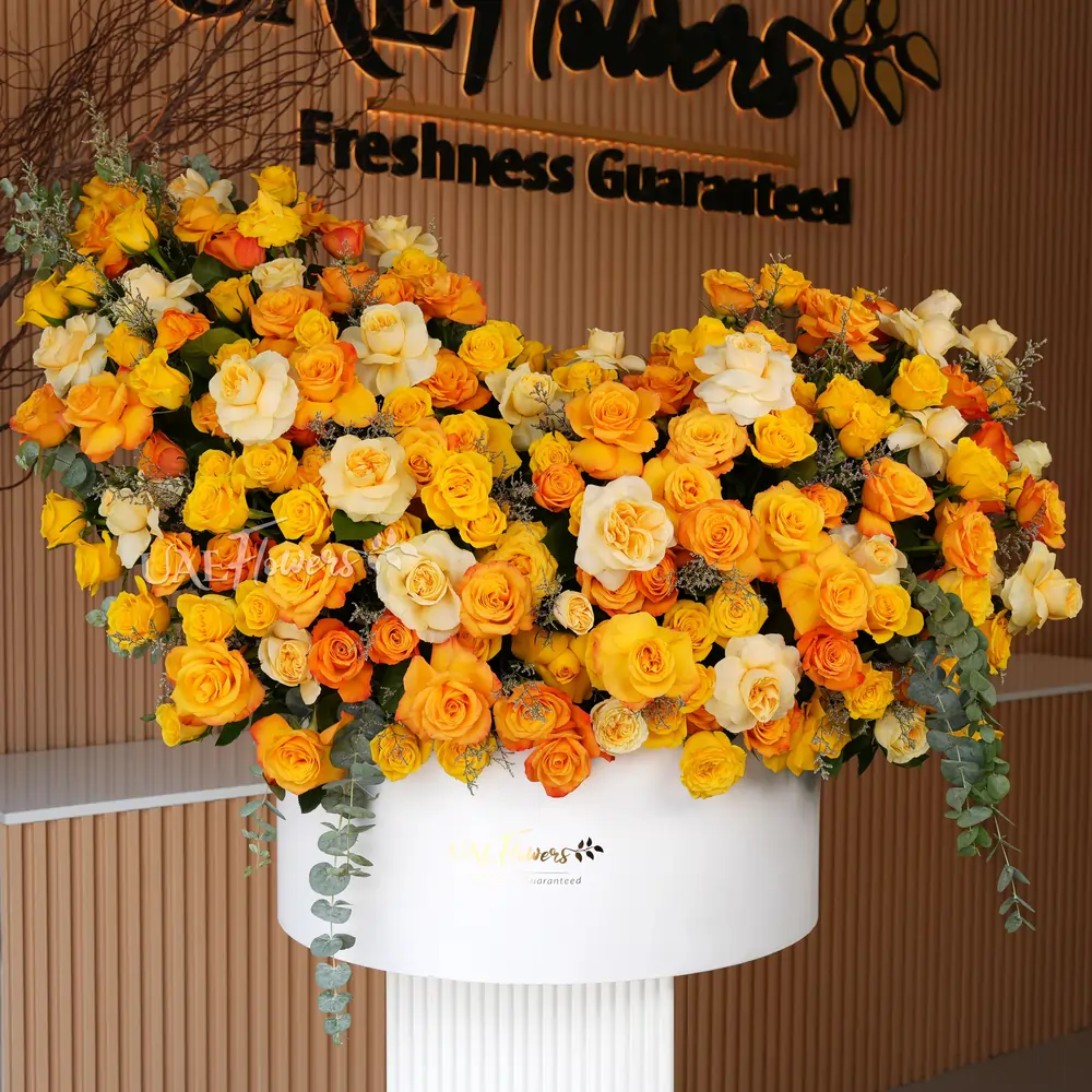 Buy XXXL Tropical Sunburst Rose Garden By UAE Flowers
